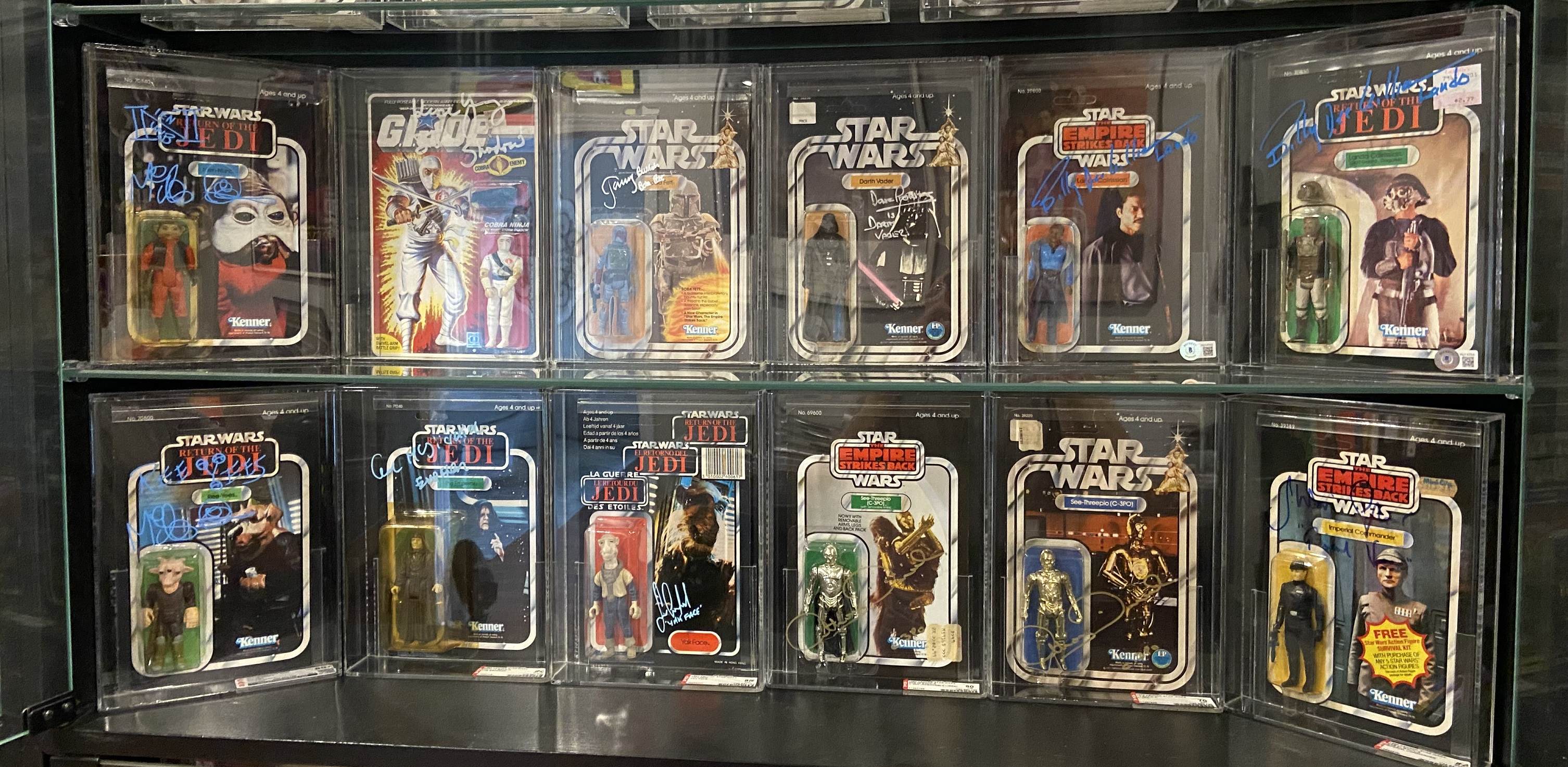 Star Wars Action Figures and Movie Poster Collection is Displayed in ...